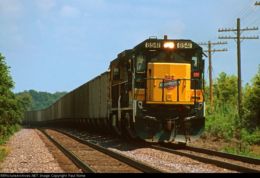 C&NW 8541, GE C40-8, handles westbound coal empties